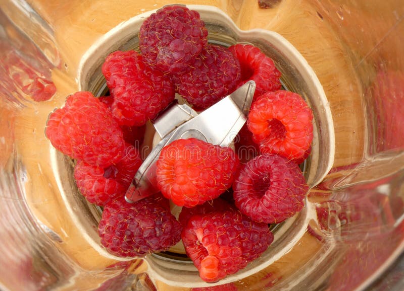 Raspberries in the Blender on Wooden Plank Stock Photo - Image of ...
