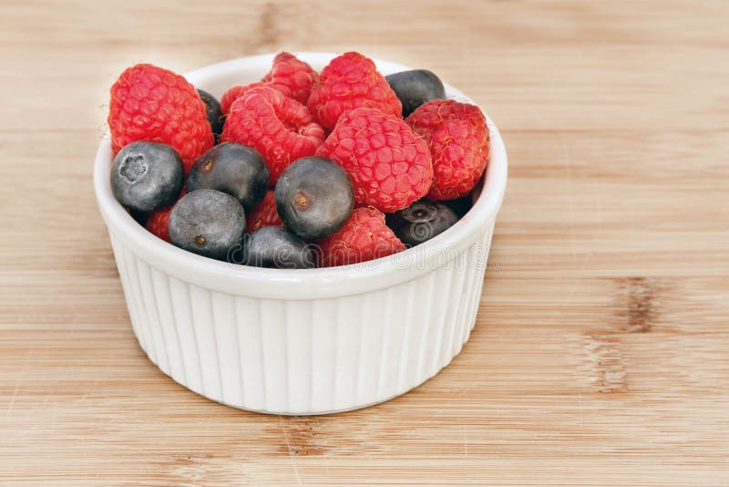 Raspberries and Blueberries Stock Image - Image of dish, blueberries ...
