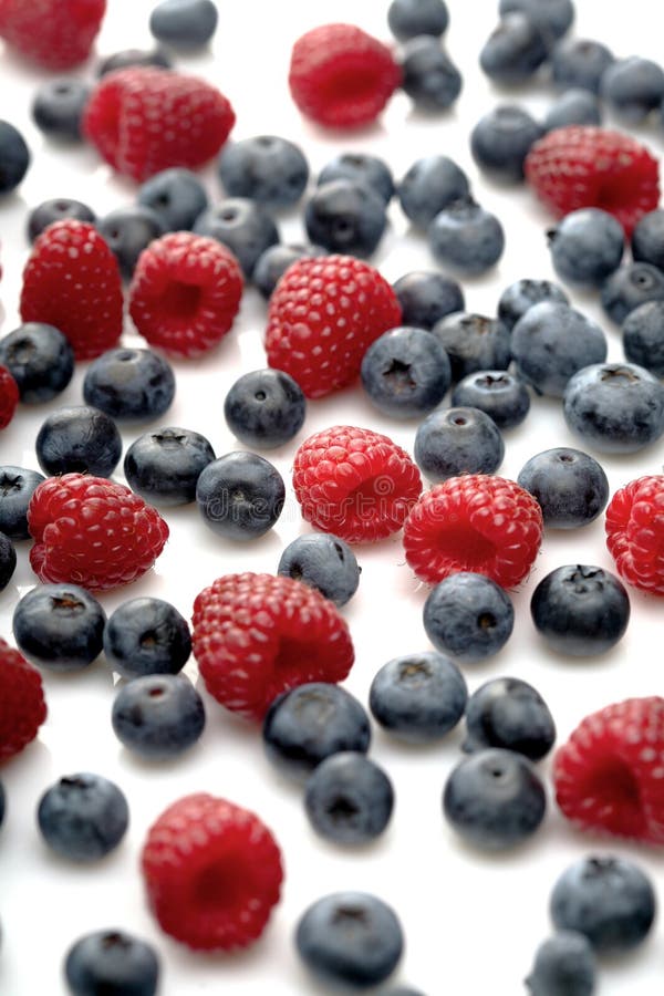 Raspberries and Blueberries on White Background Stock Photo - Image of ...