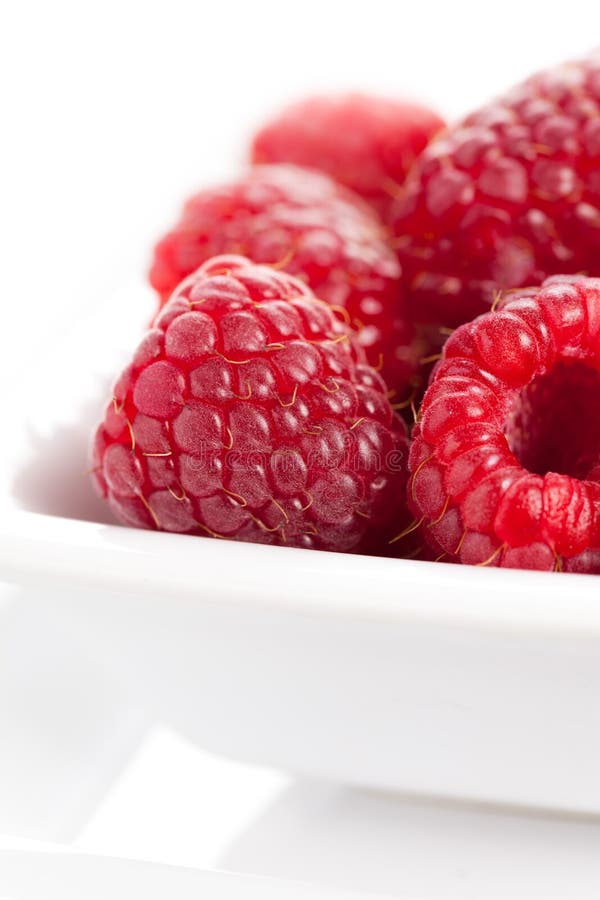 Raspberries in bowl stock photo. Image of macro, food - 16147946