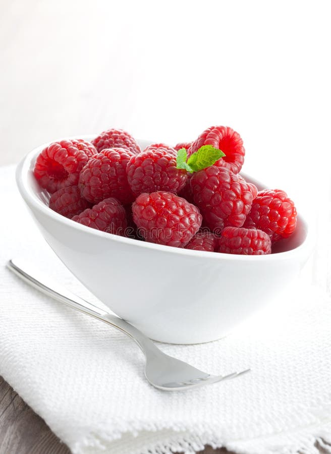 Raspberries in bowl stock image. Image of fruity, fruit - 16700127