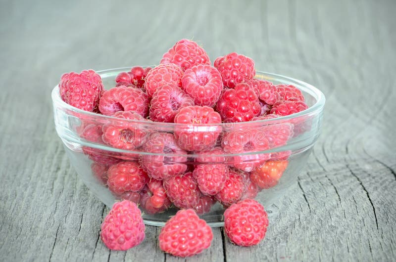 Raspberries in glass bowl stock photo. Image of ripe - 36375054