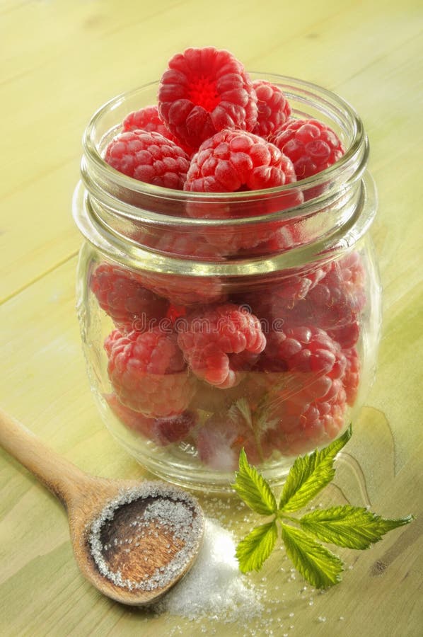 Raspberries in glass jar stock photo. Image of homemade - 10002334