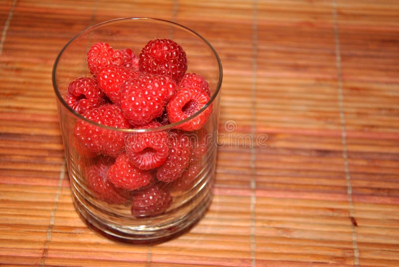 Raspberries in a glass stock photo. Image of vitamin - 43601016