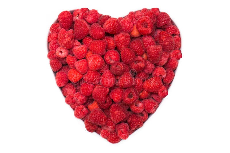 Raspberries in heart shape stock photo. Image of forest - 66113176