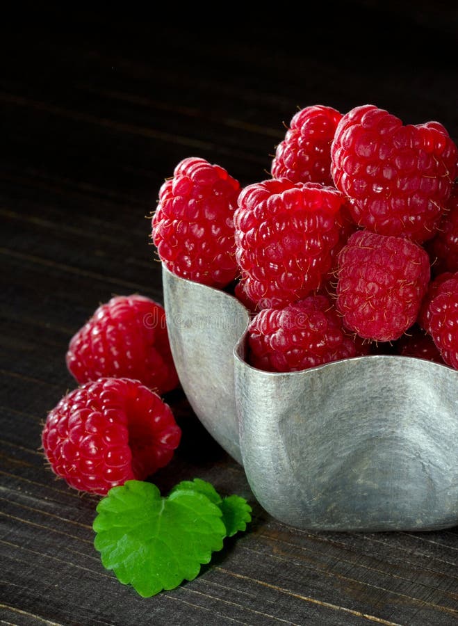 Raspberries in a metal cup stock photo. Image of healthy - 27908086