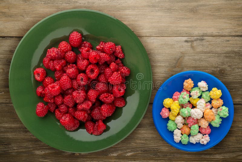 Raspberries on a Plate. Raspberries on Wooden Background Stock Image ...