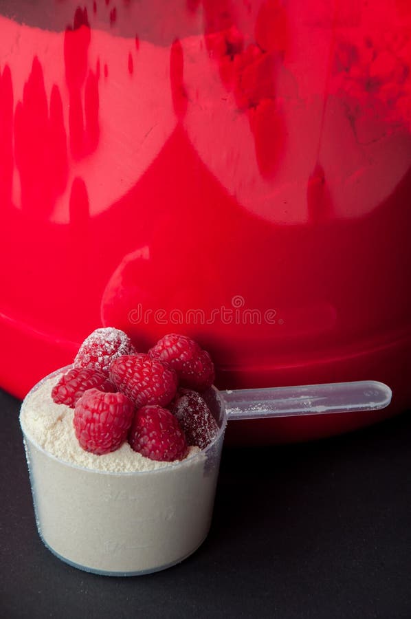 Raspberries in a Scoop of Protein Powder Stock Photo - Image of ...