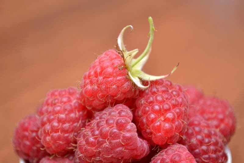 Raspberries on a Wooden Table. Natural Texture. Stock Image - Image of ...