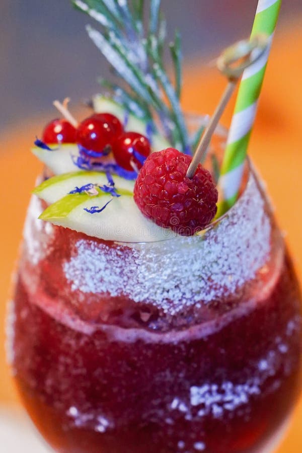 Raspberry Alcohol Cocktail on the Bar. Red Cocktail Garnished with ...