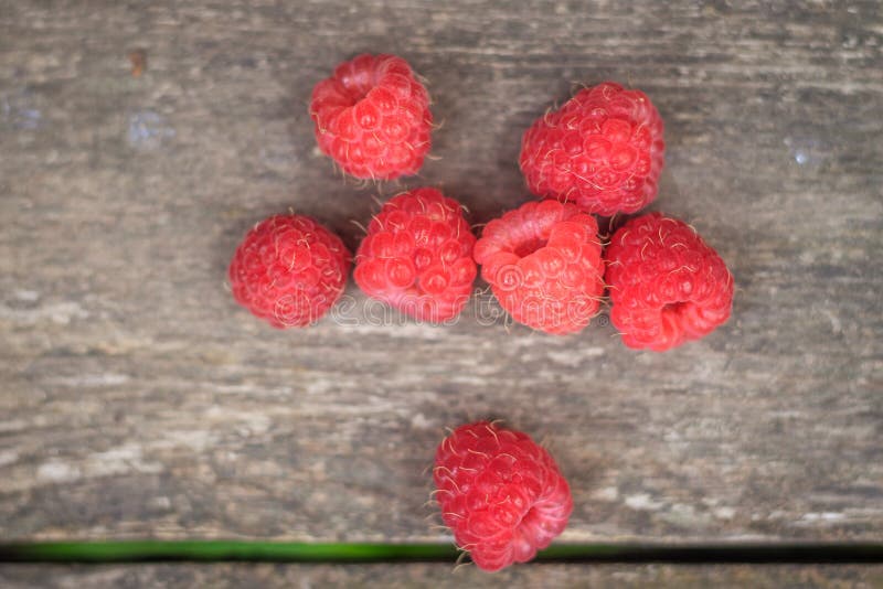 Raspberry Berries on a Wooden Background. Red Berries Stock Photo ...