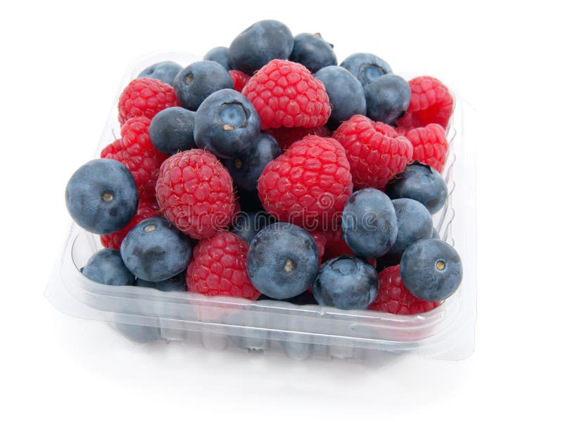 Raspberry and a blueberry stock image. Image of dieting - 15488191