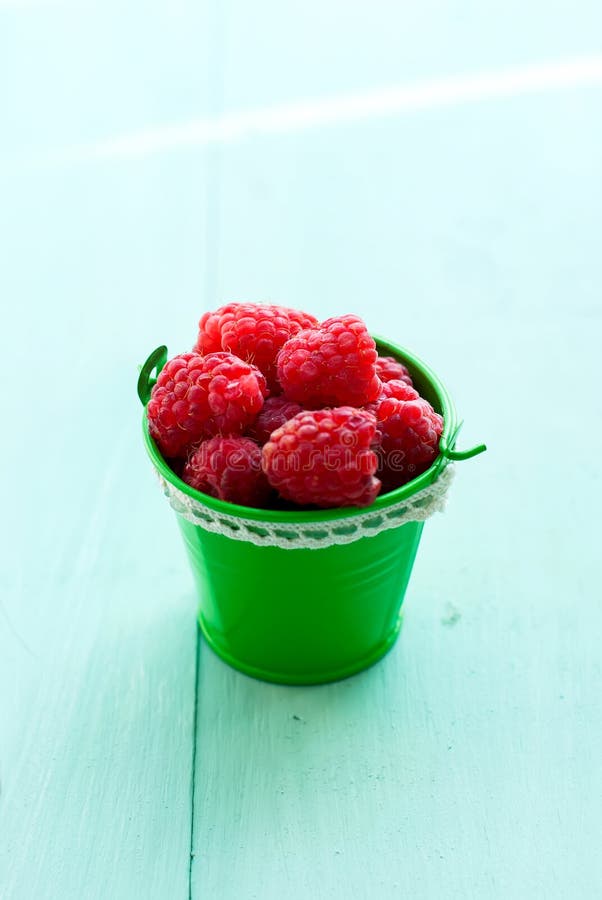 Raspberry in a bucket stock image. Image of berry, dessert - 56818421