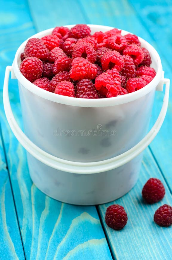 Raspberry bucket stock photo. Image of blueberry, raspberry - 59729794