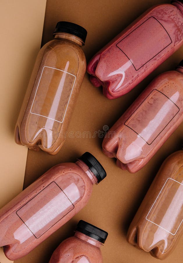 Raspberry and Chocolate Smoothie Cocktails in Plastic Bottles Stock ...