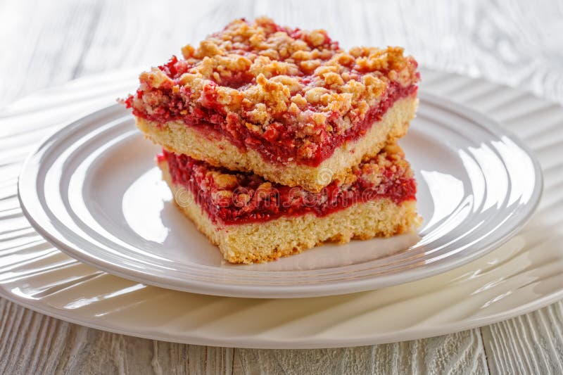 Raspberry Crumble Bars on White Plate, Top View Stock Image - Image of ...