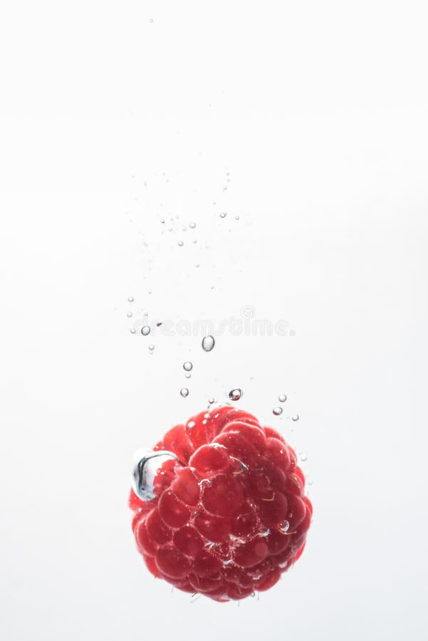 Raspberry Falling into Water Stock Image - Image of delicious, splash ...