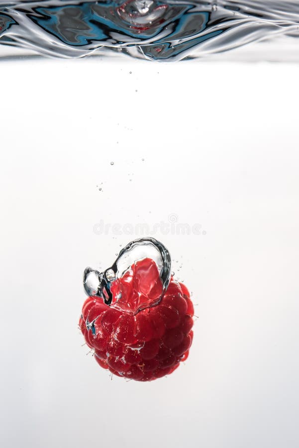 Raspberry Falling into Water Stock Image - Image of delicious, splash ...