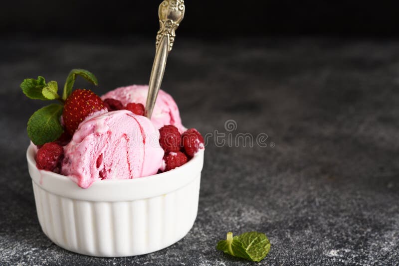 Raspberry Ice Cream in a Bowl on a Concrete Background. Horizontal ...