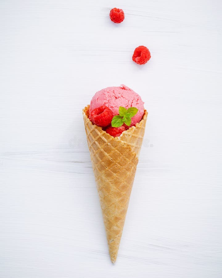 Raspberry Ice Cream in Cone with Fresh Raspberry and Peppermint Stock ...