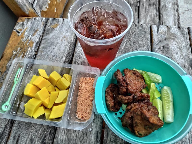 Raspberry Iced Tea with Pickled Mango and Sliced Guava. Stock Image ...