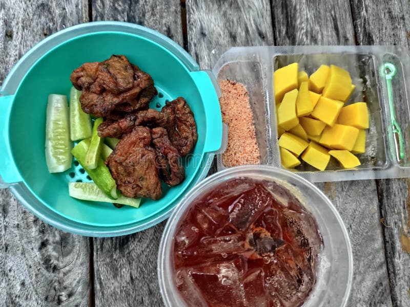 Raspberry Iced Tea with Pickled Mango and Sliced Guava. Stock Photo ...