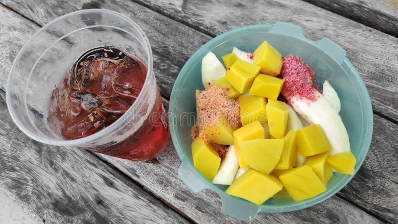 Raspberry Iced Tea with Pickled Mango and Sliced Guava. Stock Image ...