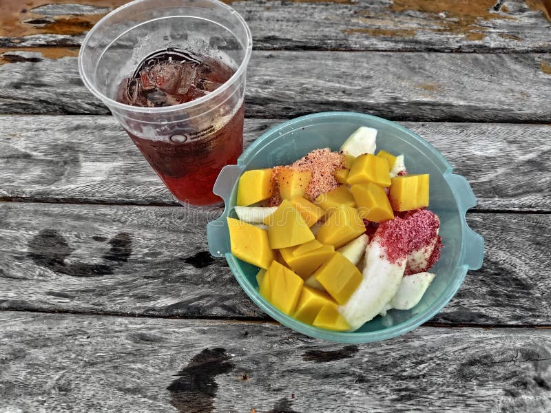 Raspberry Iced Tea with Pickled Mango and Sliced Guava. Stock Image ...