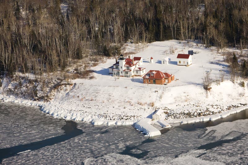 Raspberry Island Light House in Winter Stock Image - Image of ...