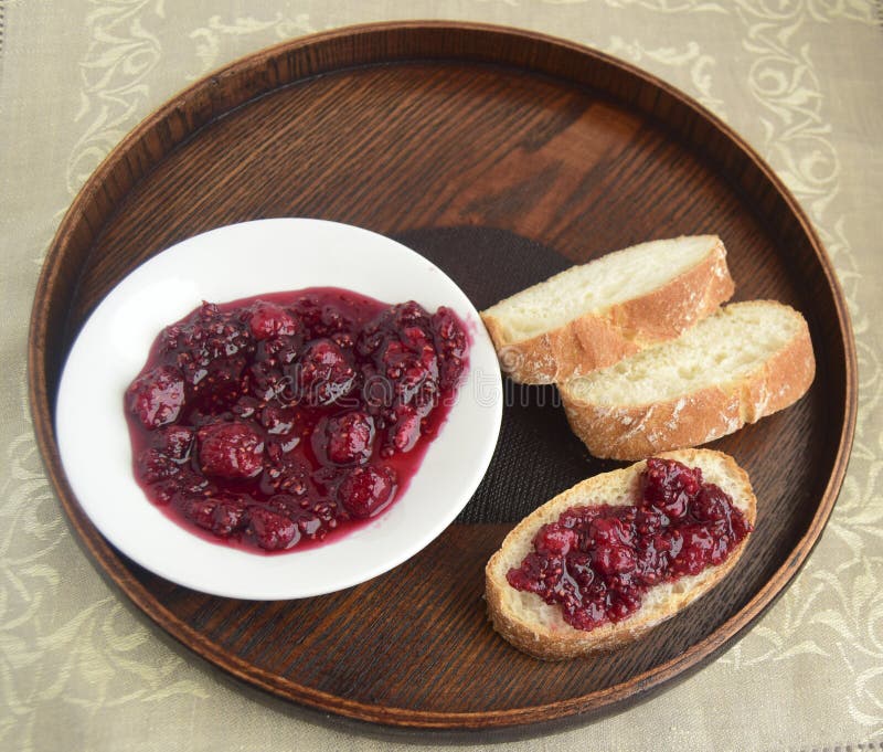 Raspberry jam and bread stock photo. Image of cooked - 87299766