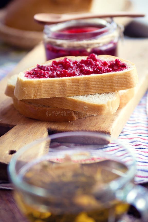 Raspberry jam with bread stock image. Image of jelly - 68286965