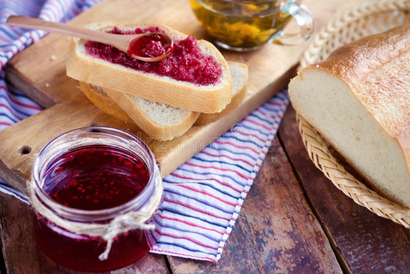 Raspberry jam with bread stock image. Image of breakfast - 68333525