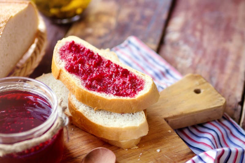 Raspberry jam with bread stock image. Image of ripe, preserve - 68333695