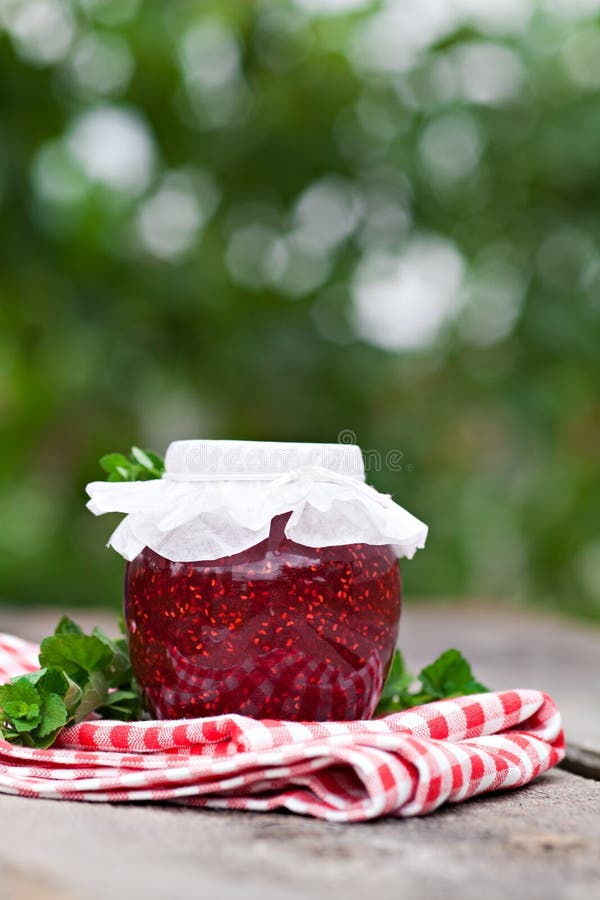 Raspberry jam in a jar stock image. Image of glass, food - 32500463