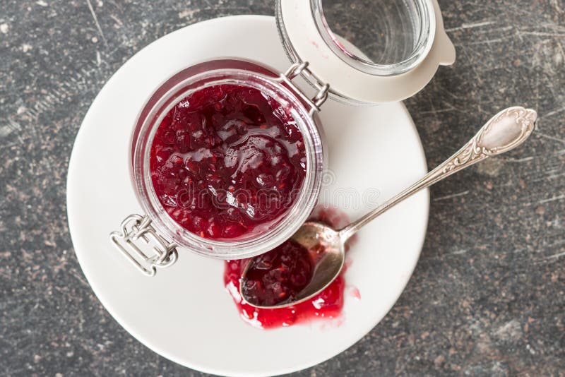 Raspberry jam jelly. stock photo. Image of overhead - 117205484