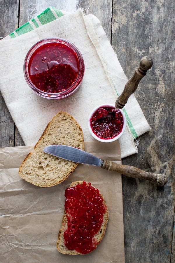 Raspberry jam on the table stock photo. Image of health - 41734574