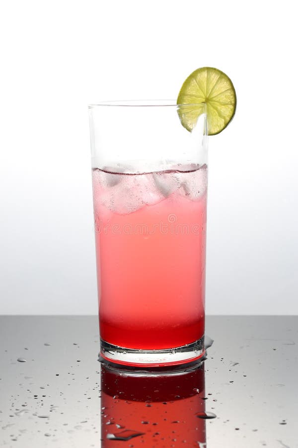 Raspberry Lemonade with Lime in a Glass Stock Photo - Image of lime ...
