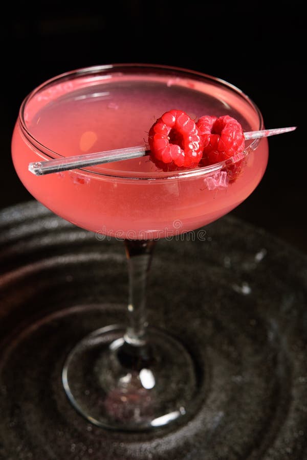 Raspberry pink cocktail stock image. Image of dark, cocktails - 95776119