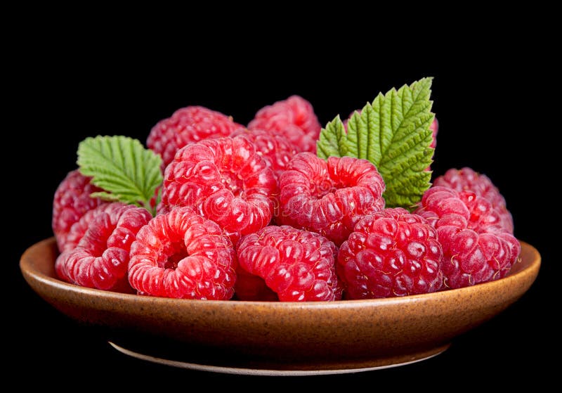 Raspberry in plate stock image. Image of closeup, black - 48243705