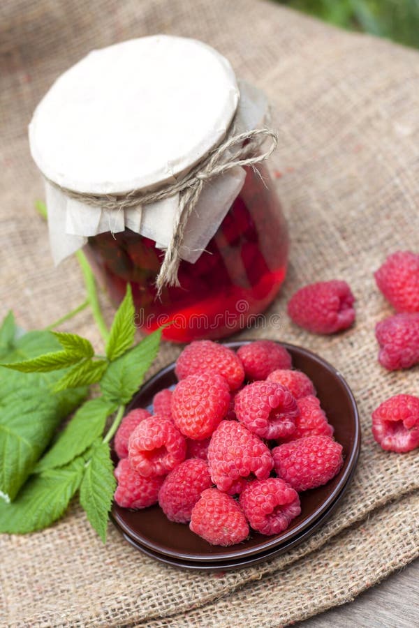 Raspberry Preserve in Glass Jar and Fresh Raspberries Stock Image ...