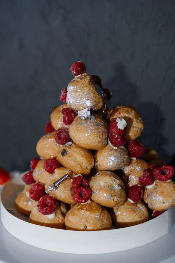 Raspberry Profiteroles in the Form of a Slide with Edible Silverware on ...