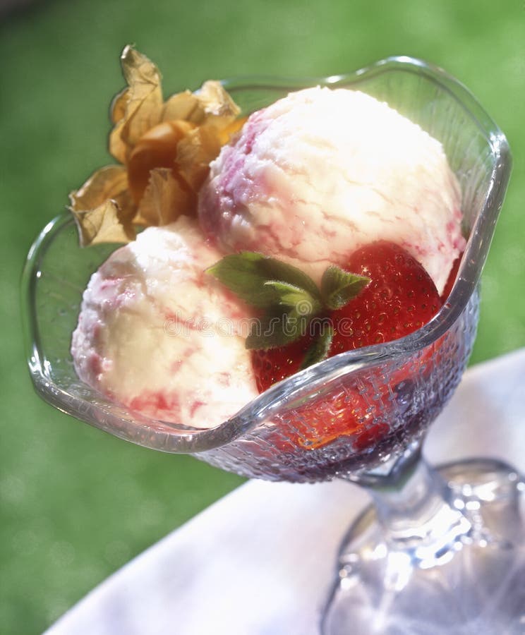 Raspberry Ripple Ice Cream and Strawberries in Sundae Glass Stock Photo ...