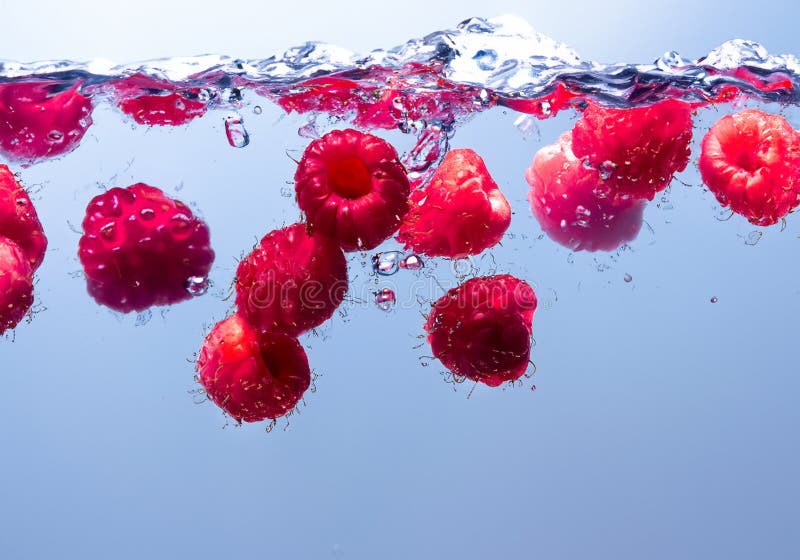 Raspberry splash in water stock illustration. Illustration of bubble ...