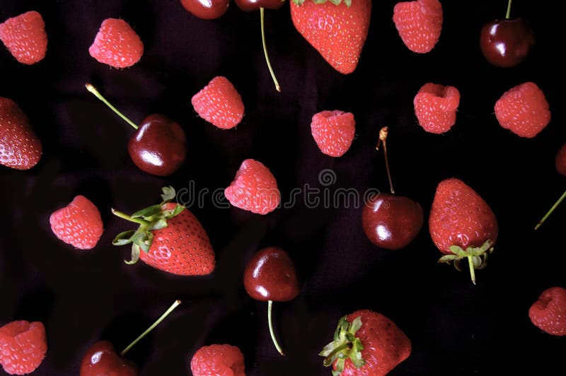 Strawberry cherry on black stock image. Image of food - 244145547