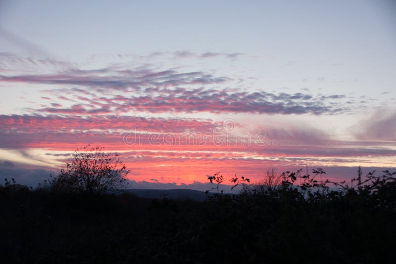 The raspberry sunset. stock photo. Image of mountains - 83131916