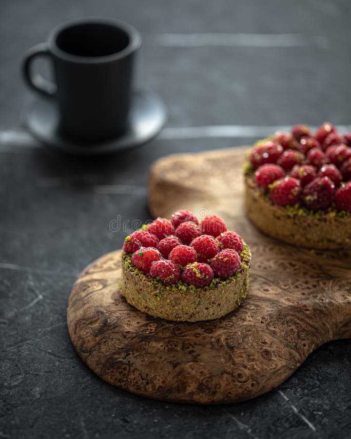 Two Delicious Raspberry Tartlets with Pistachios Stock Image - Image of ...