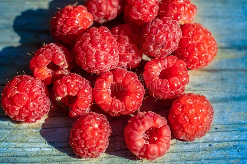 Red Ripe Raspberry on Wooden Table Stock Image - Image of orange ...