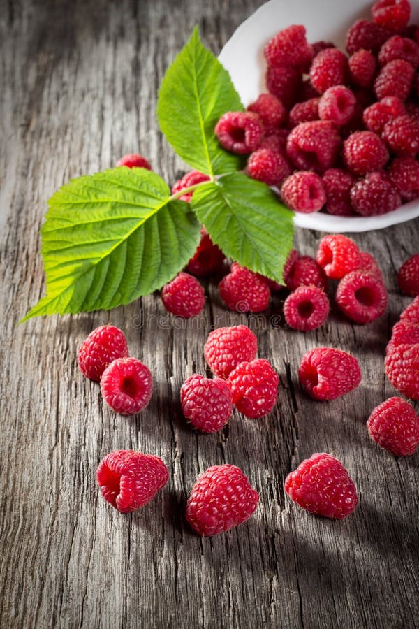 Raspberry on wooden table stock image. Image of gourmet - 59842359