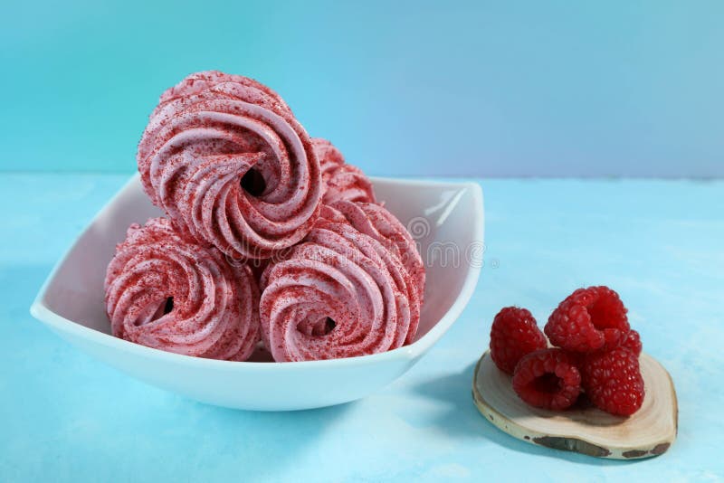 Raspberry Zephyr with Powdered Sugar and Raspberries Stock Image ...