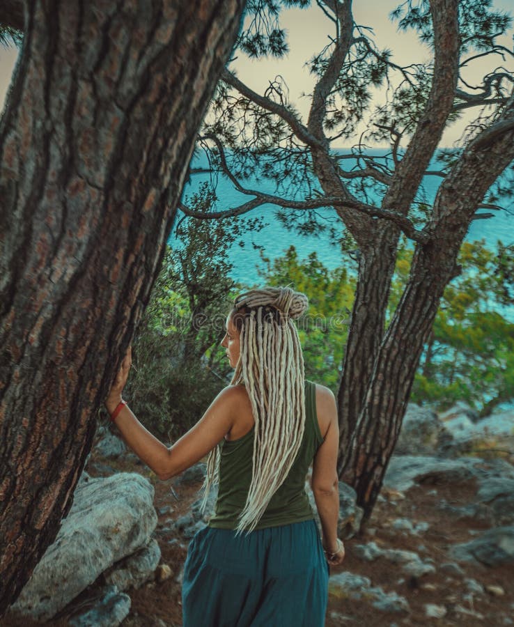 Rasta Girl with Dreadlocks Resting on the Mediterranean Coast Stock ...